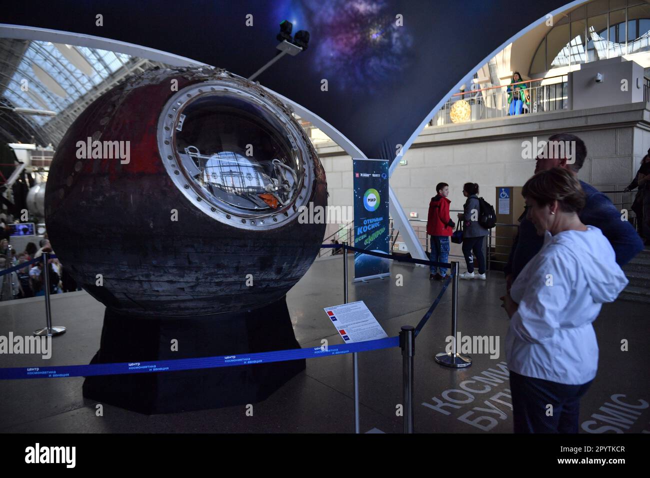 Moscow. Visitors near the descent module of the Vostok-6 spacecraft by ...