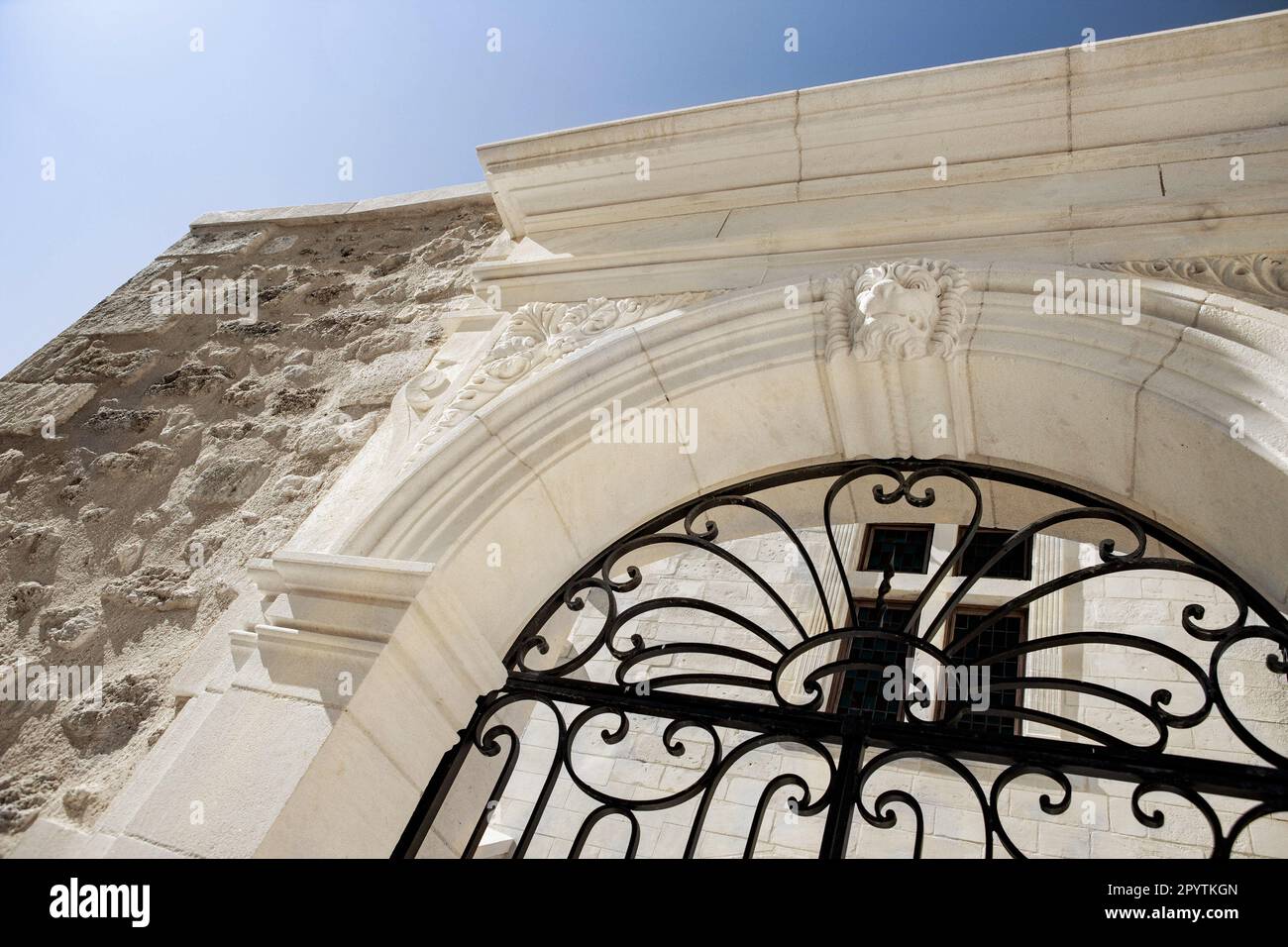 Stone arch in the facade of a castle in the south of France Stock Photo ...