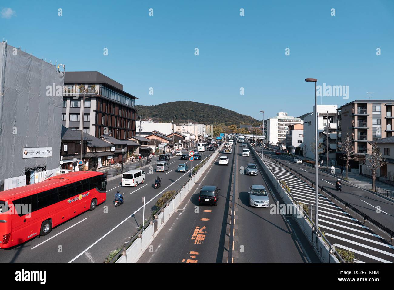 KYOTO, JAPAN - April 3, 2023: View of Gojo dori street from footbridge ...