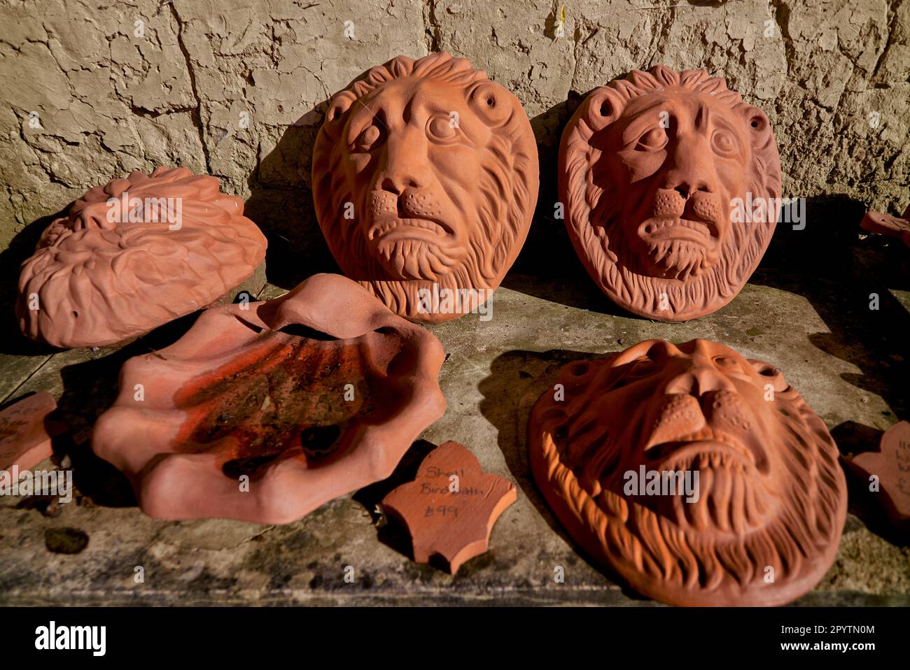 Terracotta Lion faces at Whichford Pottery and Straw Kitchen, Whichford ...
