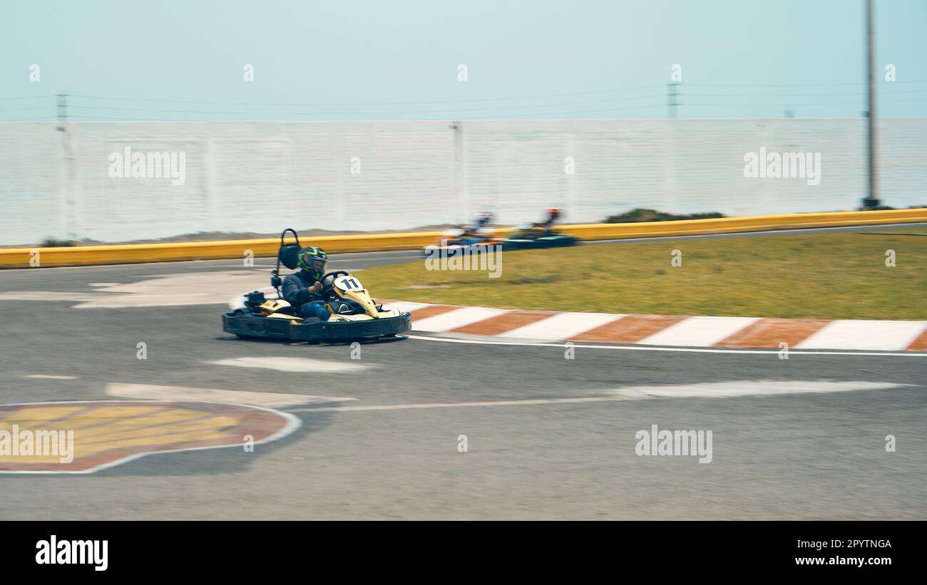 LIMA, 2023. Kartodromo Racing Dakart, A driver in gear and helmet ...
