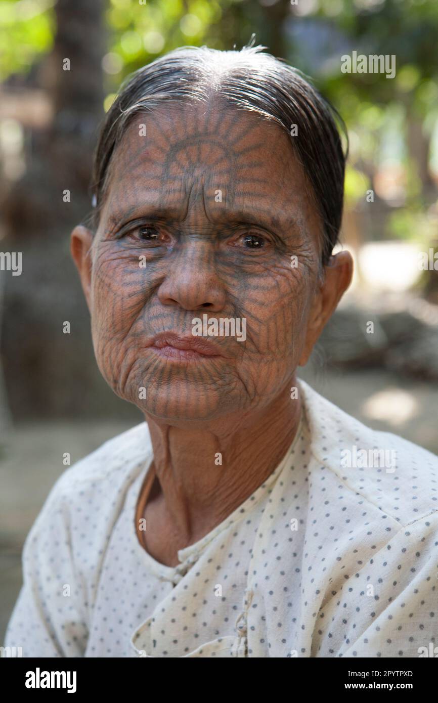 Chin matriarch proudly wears traditional tattoo on her face Stock Photo ...