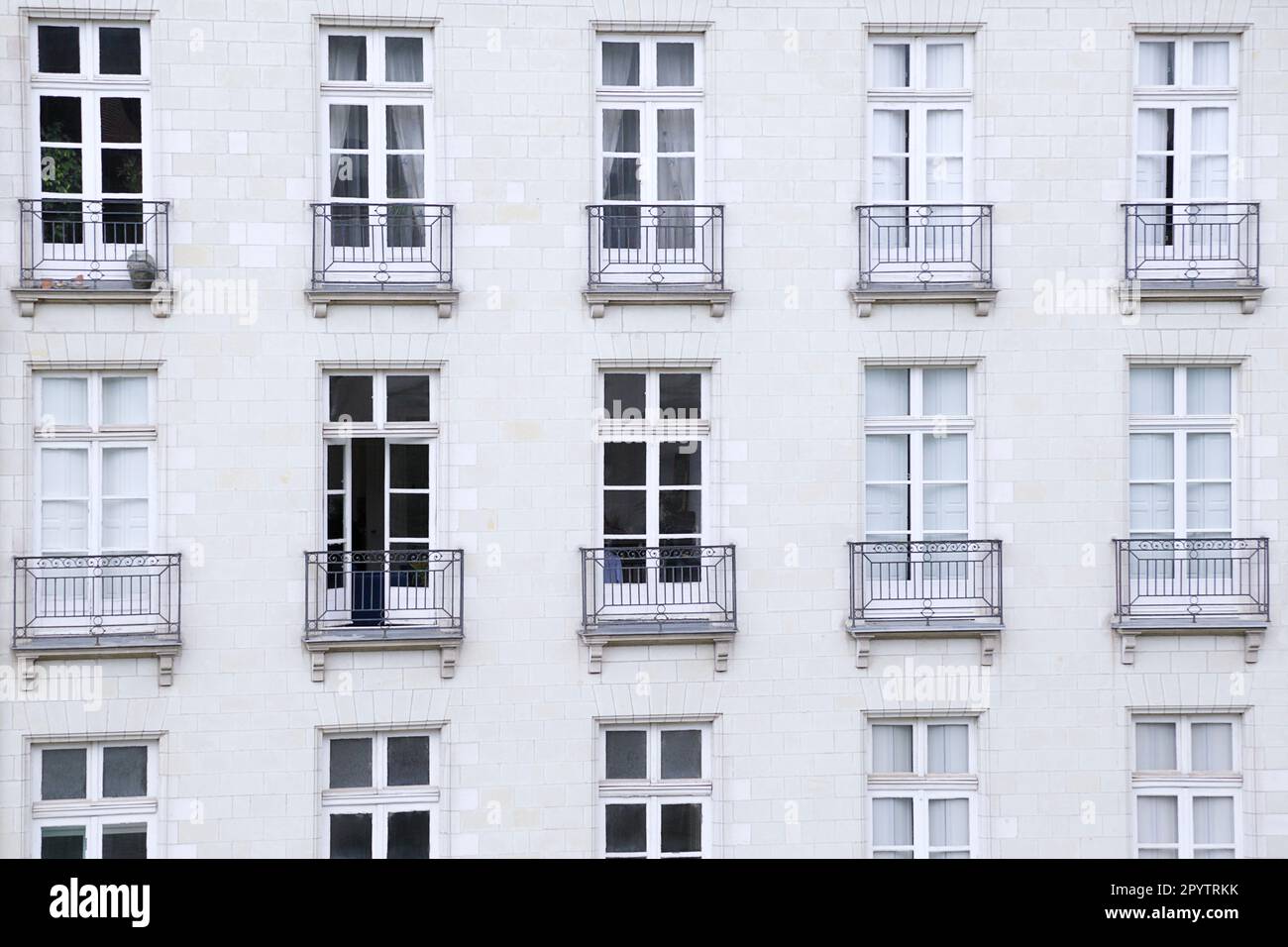 White building exterior with windows Stock Photo - Alamy