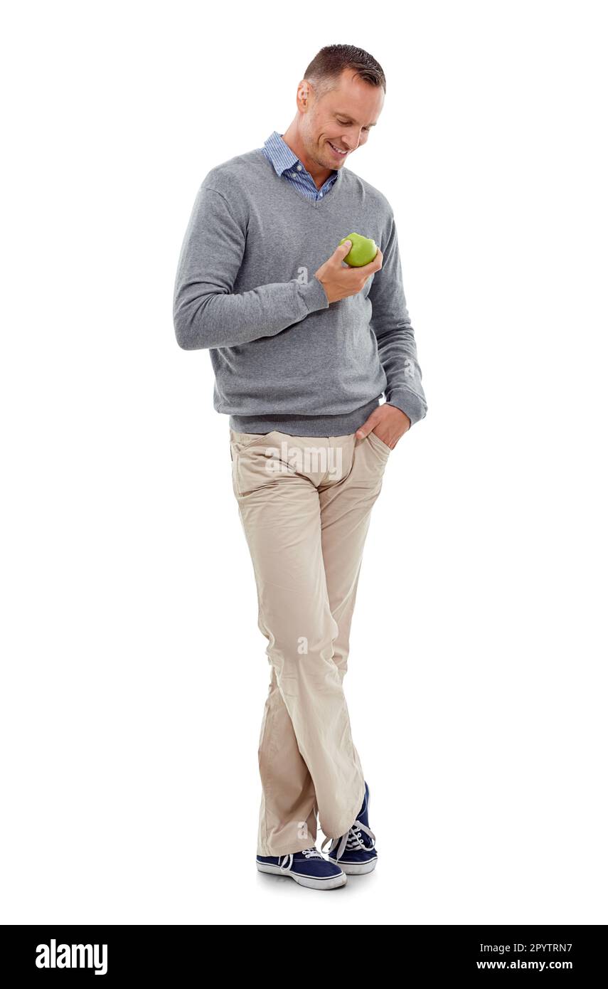 Thinking, smile or happy man with an apple or healthy food isolated on ...