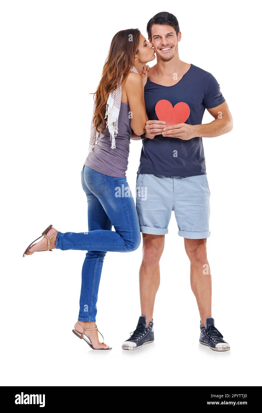 Portrait, kiss and couple with a heart, happiness and romance isolated ...