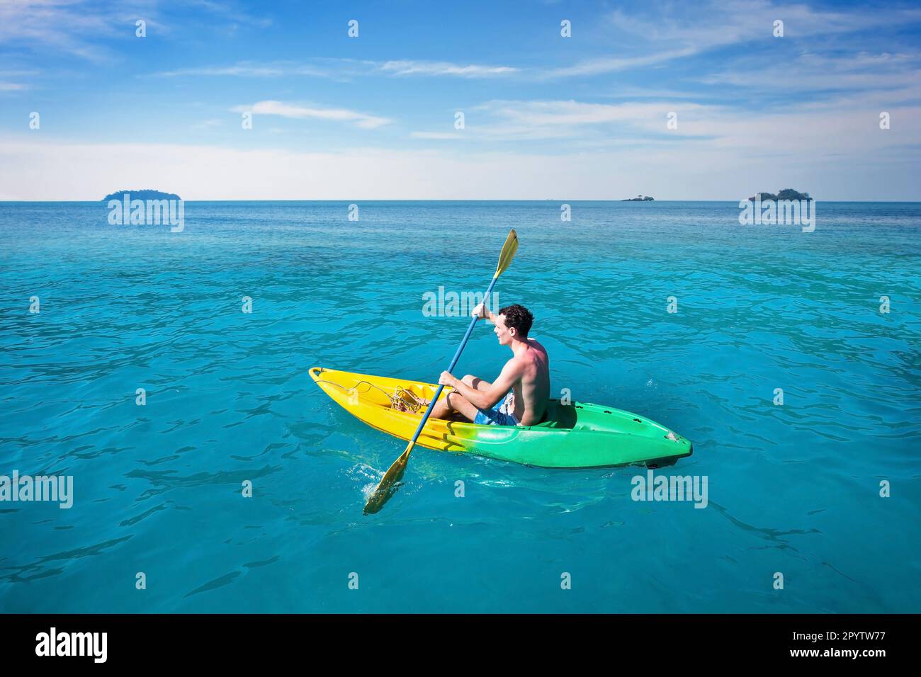 tourist paddling on kayak in tropical sea, beach travel leisure, active ...