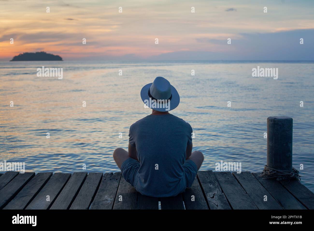 relaxation and tranquility, person looking at beautiful sunset ...