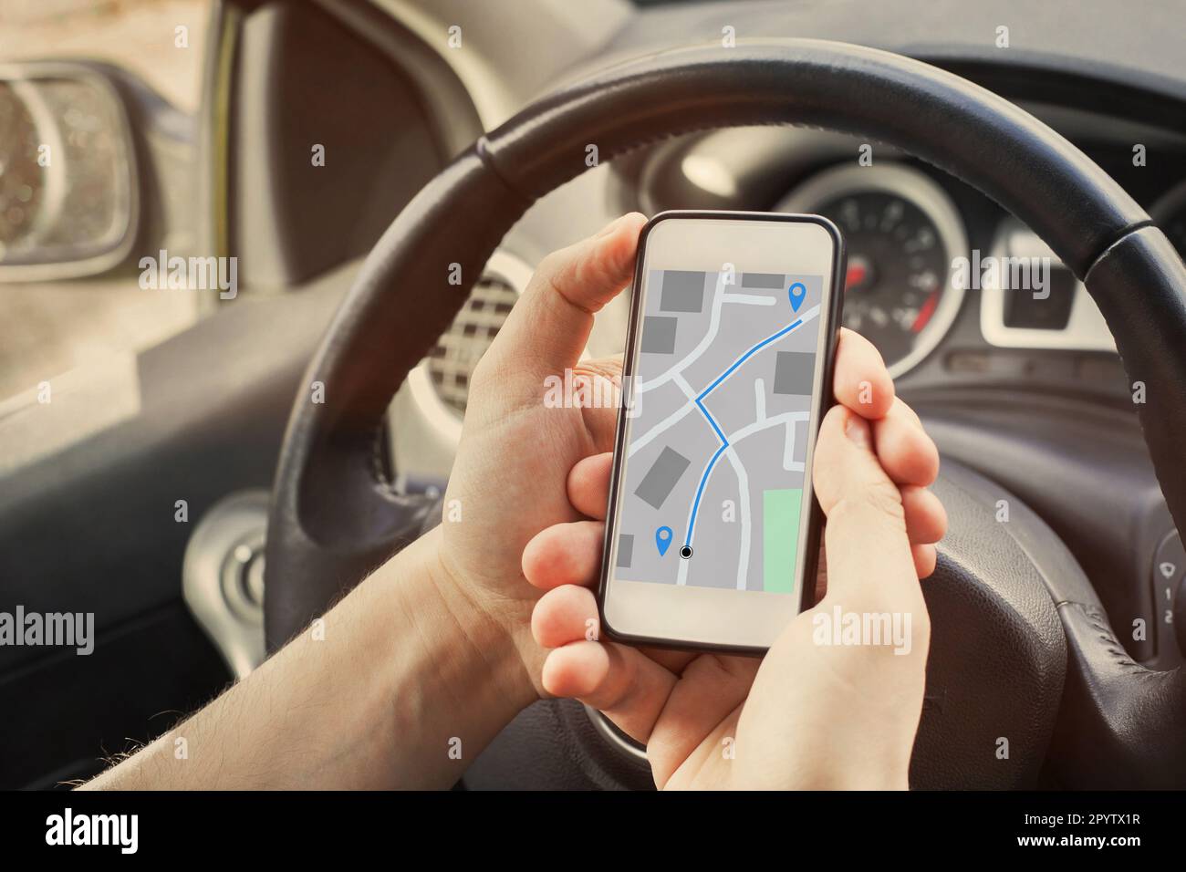 Driver Using Direction Navigation On Gps Map On The Screen Of Mobile Smartphone In The Car Stock
