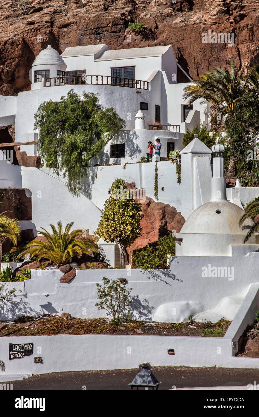 Spain, Canary Islands, Lanzarote island. Nazaret. Home in and on lava ...