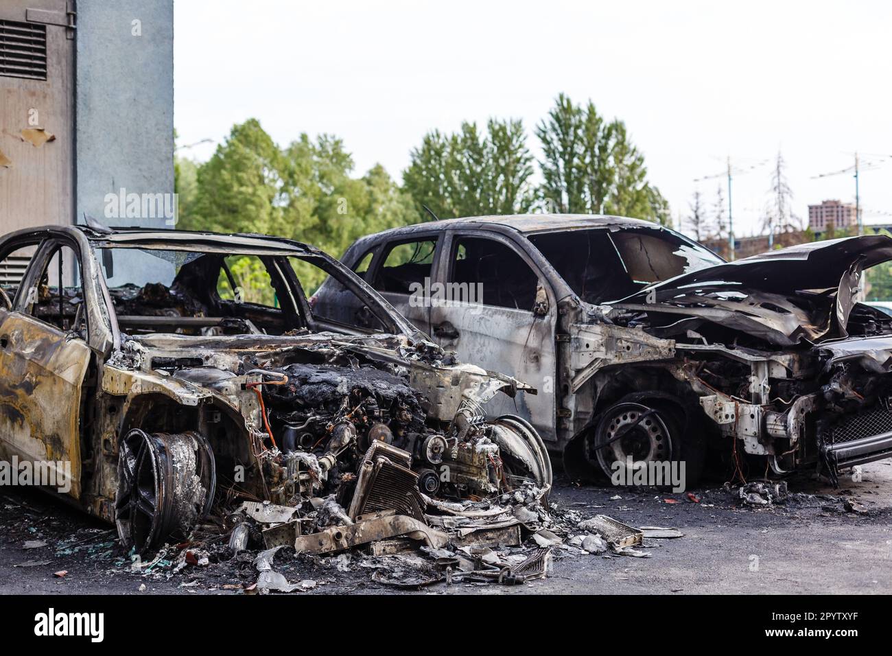 Broken and burned cars in the parking lot, accident or deliberate ...