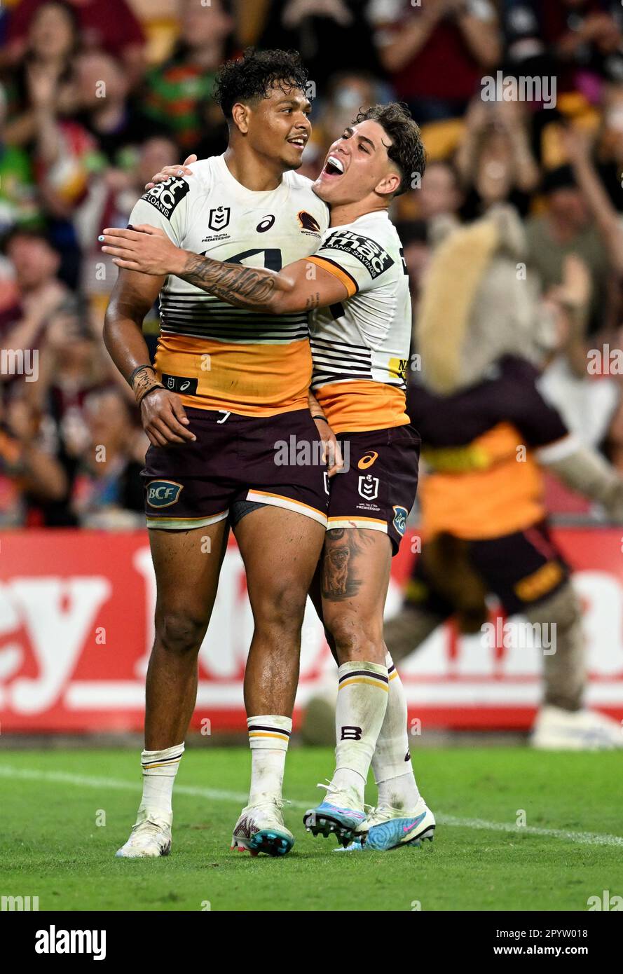 Selwyn Cobbo (left) of the Broncos celebrates scoring a try with Reece ...
