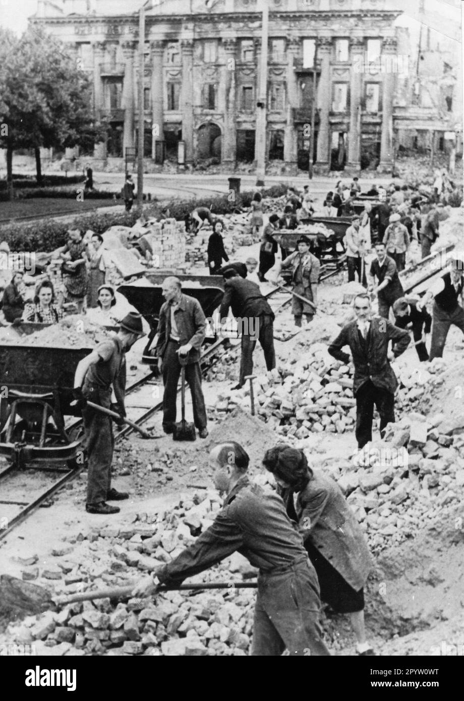 People clearing the rubble at the Platz der Einheit in Potsdam. War ...