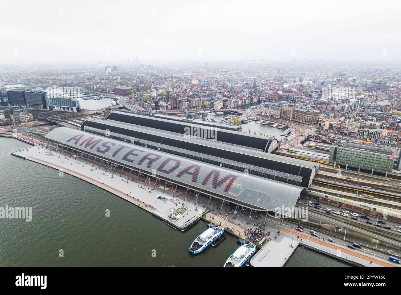 Aerial view of NS Railway Central Station. The name of Amsterdam is ...
