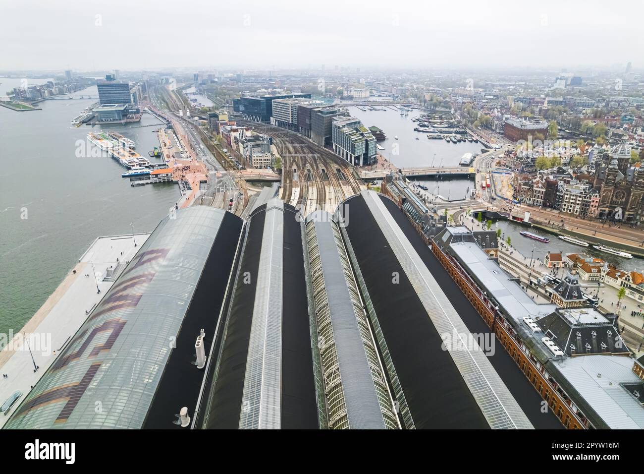 Aerial view of Central Station. The name of Amsterdam is written in ...