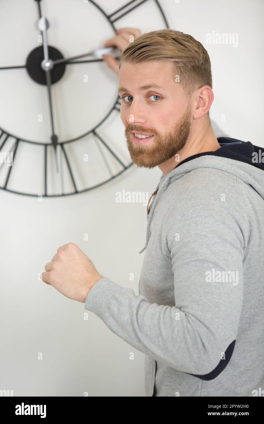 Man and clock and changing hi-res stock photography and images - Alamy