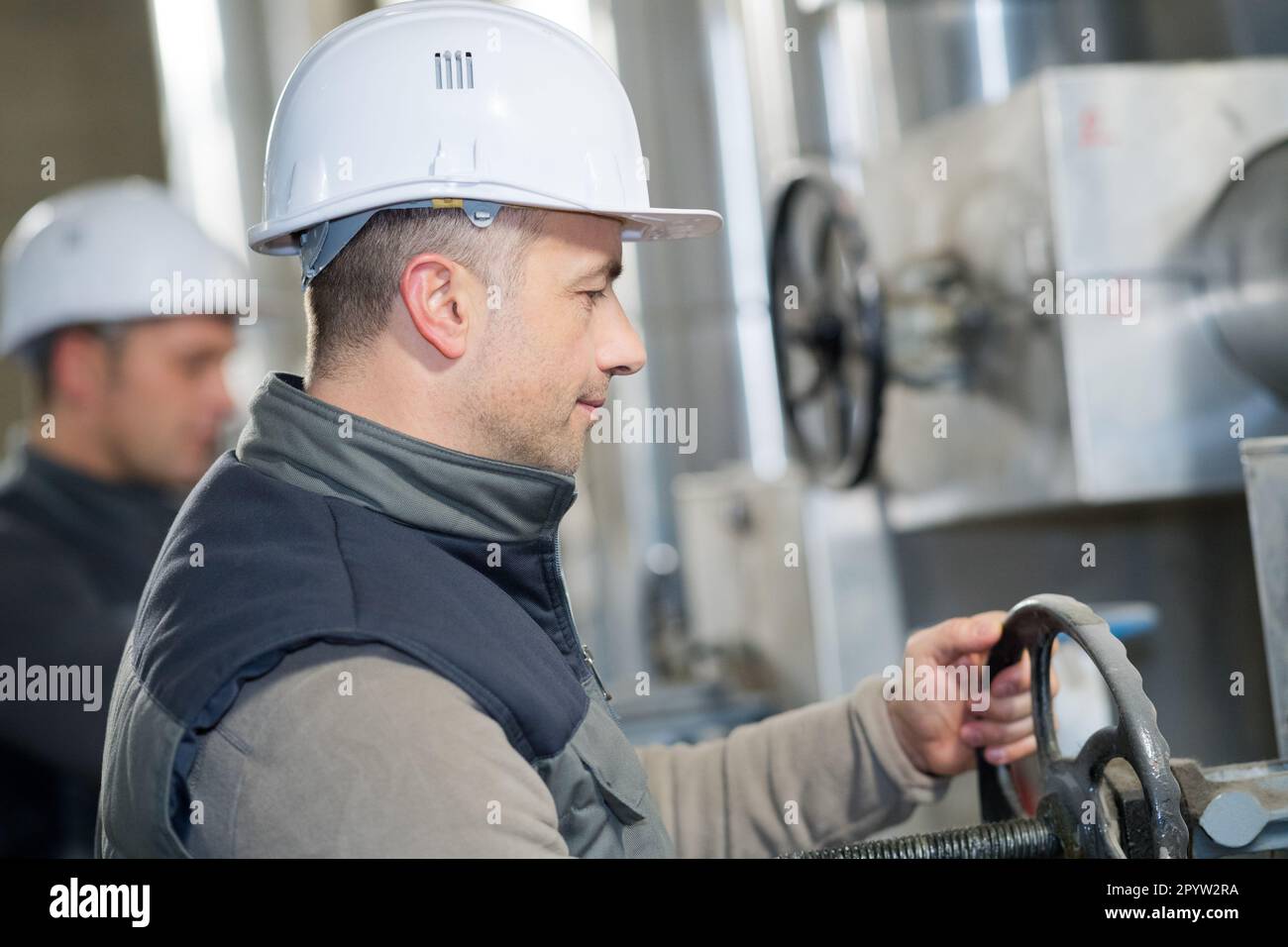 Oil valve turning hi-res stock photography and images - Alamy