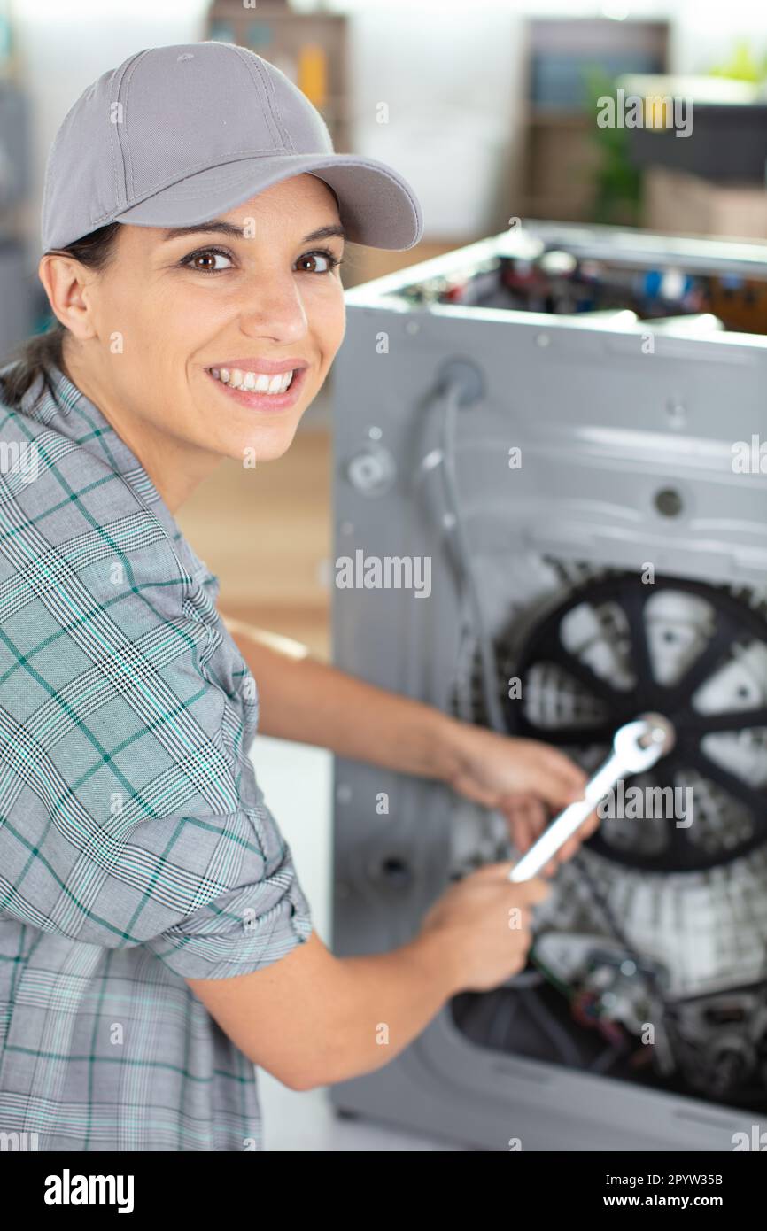 Female service agent repairing hi-res stock photography and images - Alamy