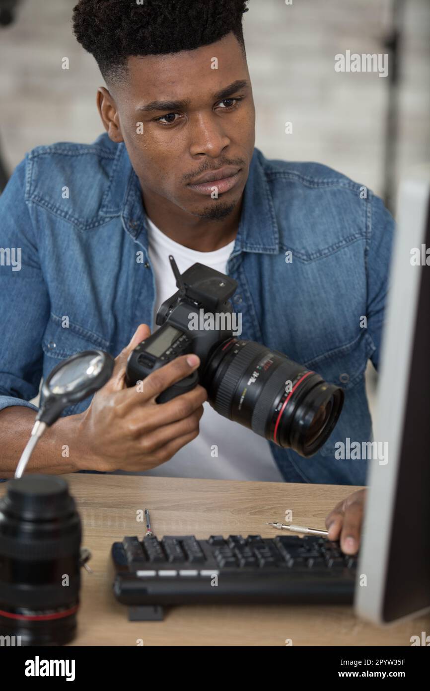 professional photographer works in photo editing app Stock Photo - Alamy