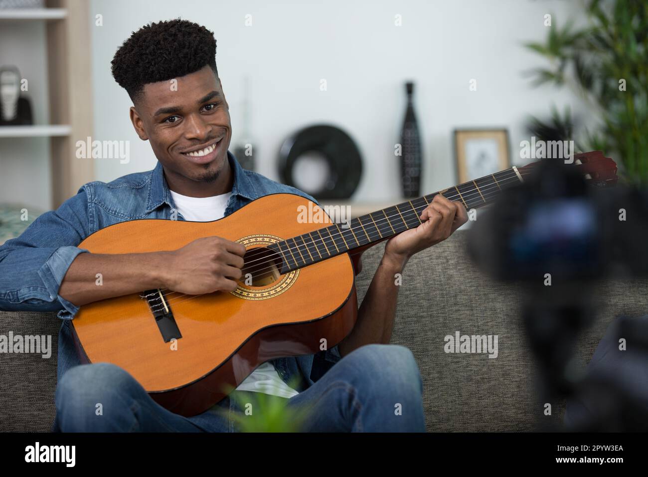 Recording himself hi-res stock photography and images - Alamy