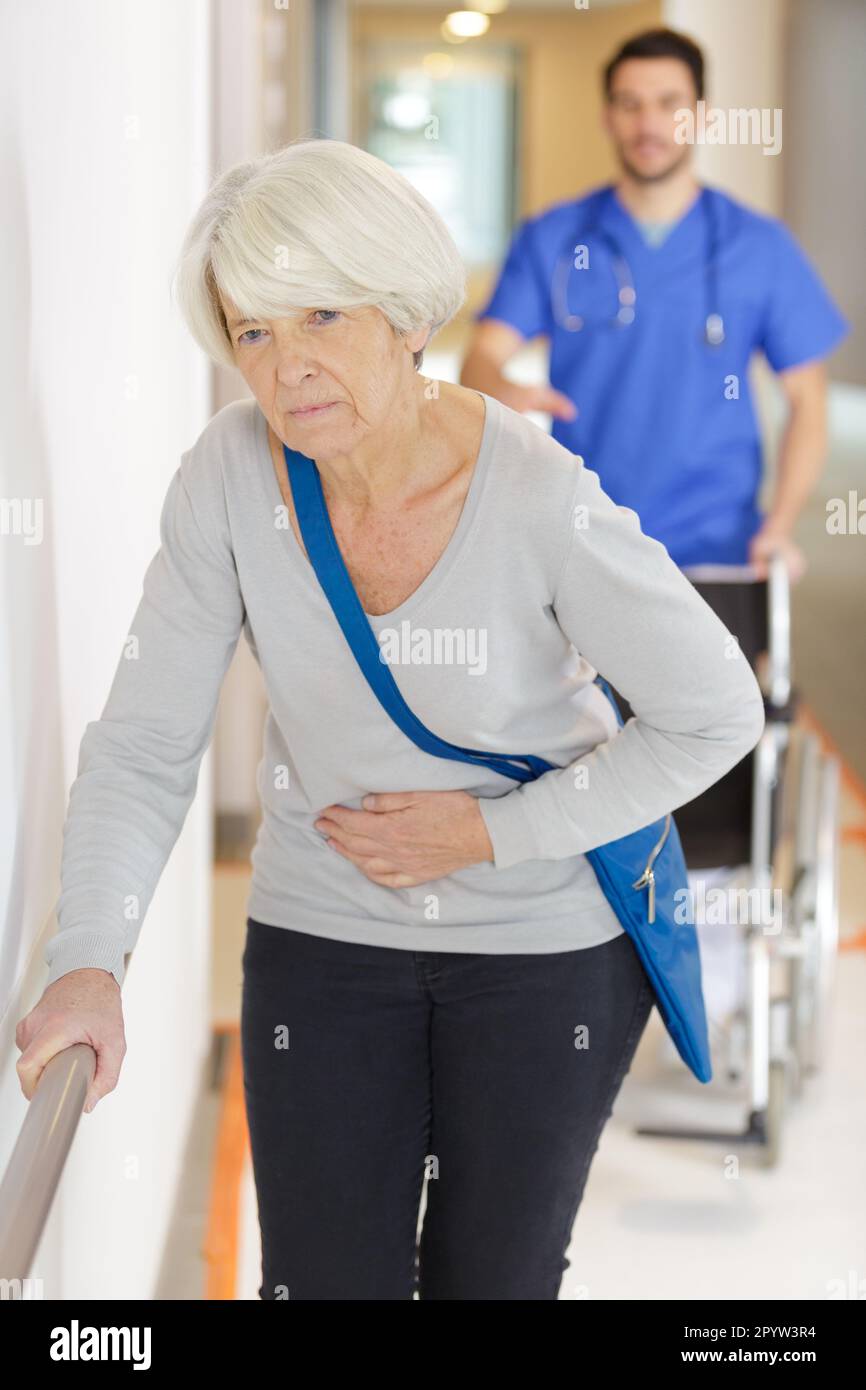 patient suffering from stomach ache in hospital Stock Photo - Alamy