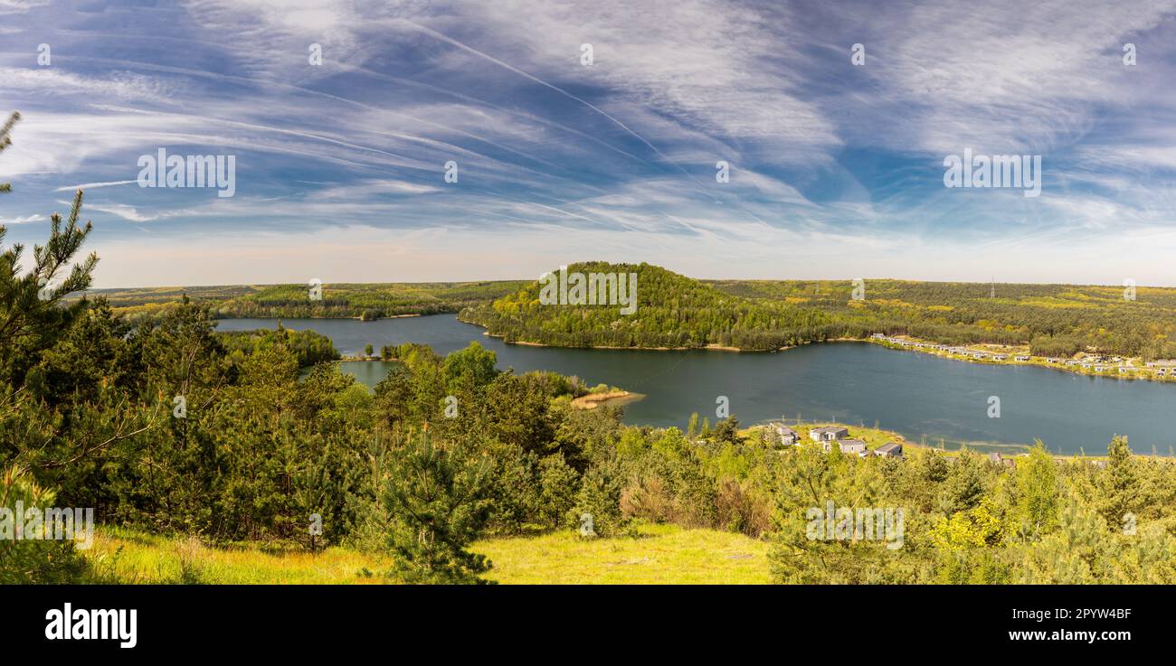 The hills of a former coal mine near the Belgium city of Maasmechelen ...