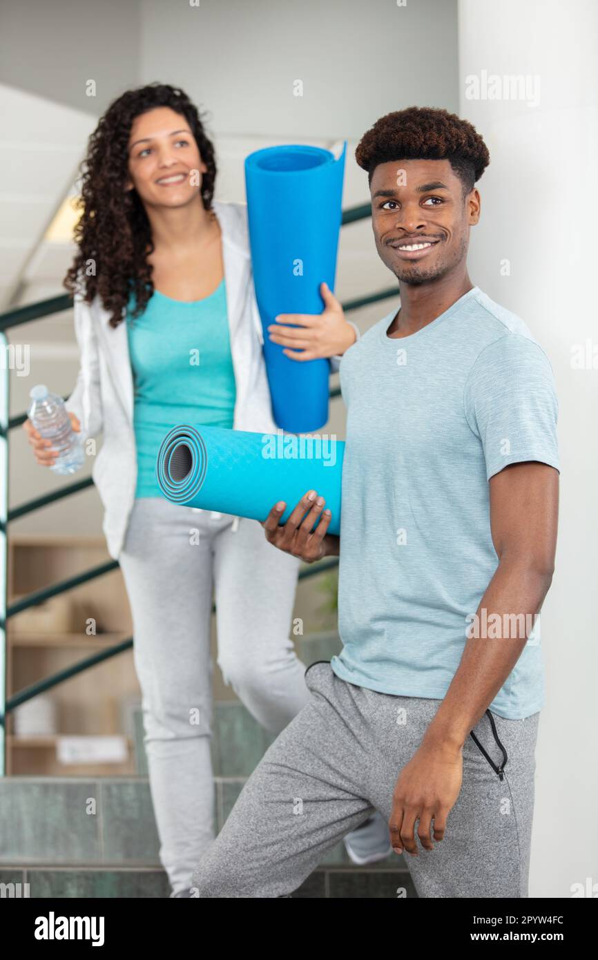 sporty fit couple having fun working out at home Stock Photo - Alamy
