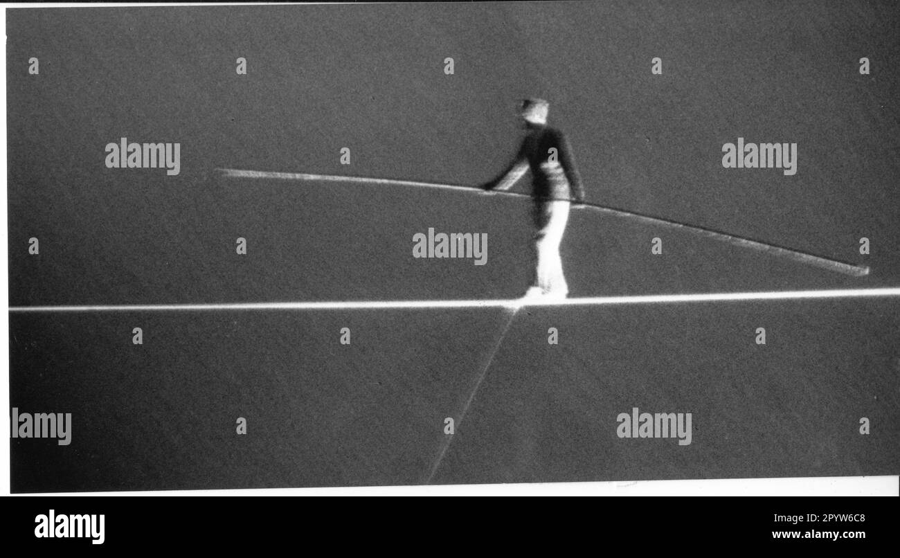 High-wire artist Matthias Traber performing a high-wire act from the ...