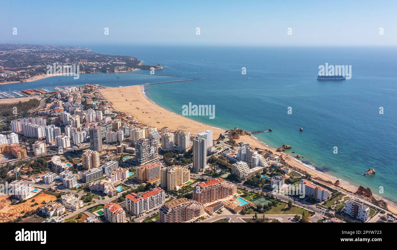 Aerial view of the Portuguese city of Portimao with high-rise buildings ...