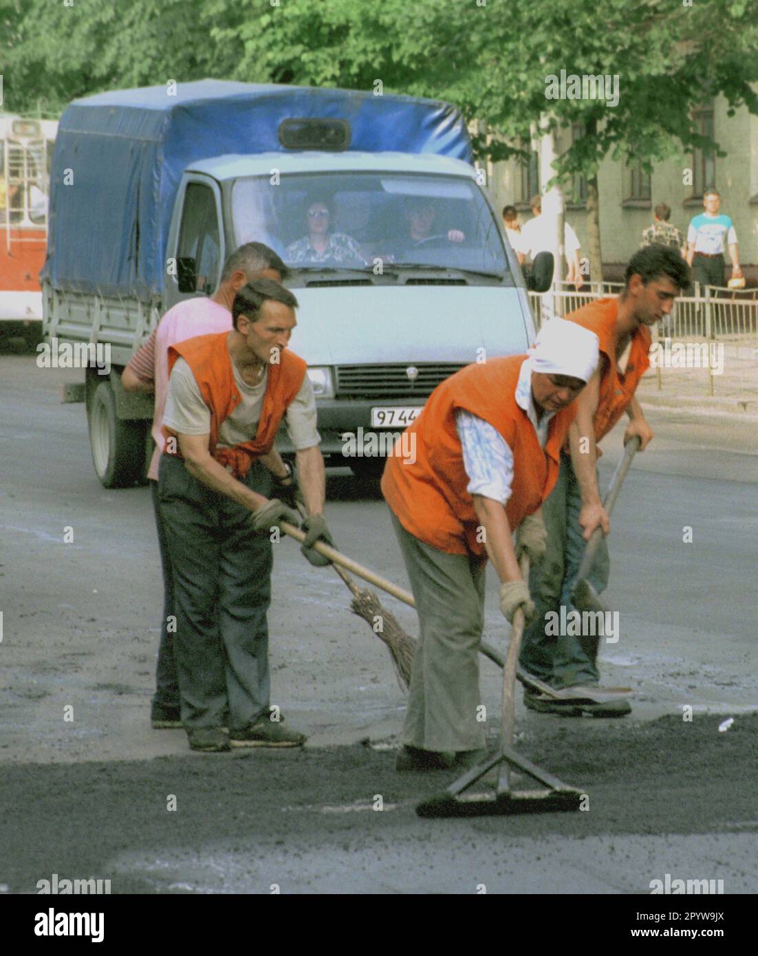 Ukraine / Shitomir / 1998 Women building roads, repairing potholes ...