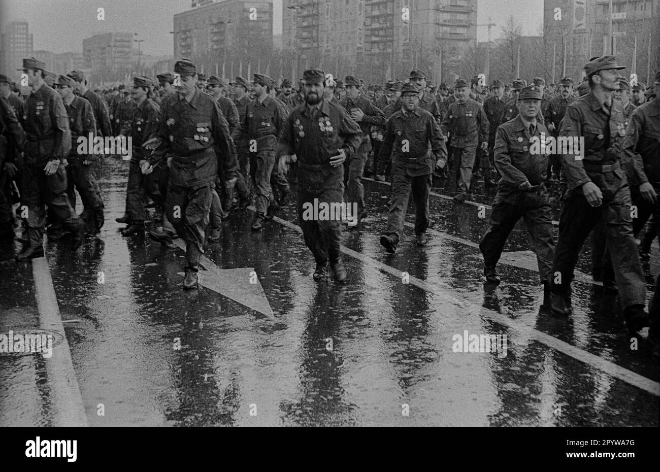 GDR, Berlin, 01.05.1987, 1. May rally 1987 on the Karl-Marx-Allee, rain showers, combat groups ...