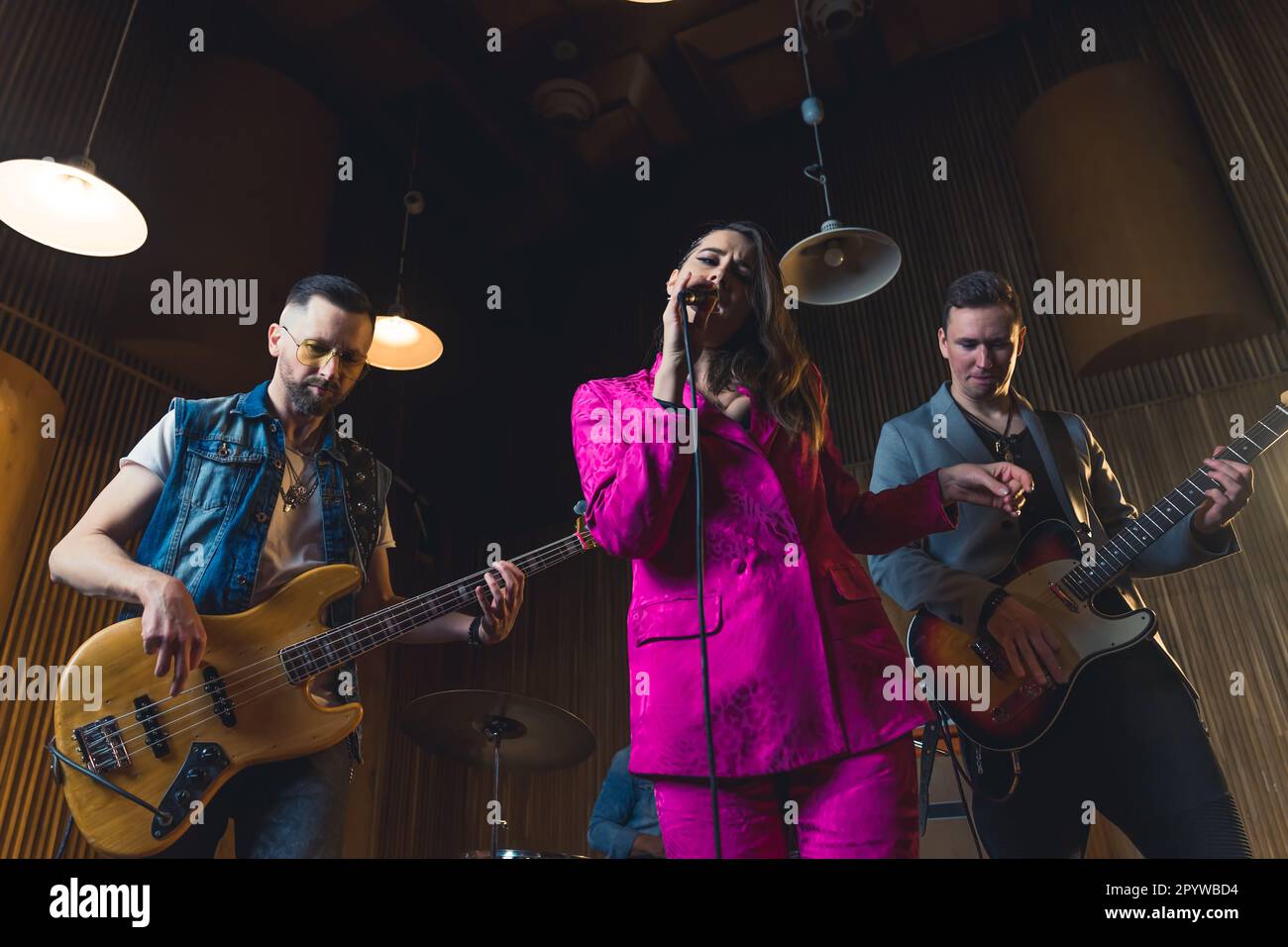 Rock band rehearsal in the studio. High quality photo Stock Photo - Alamy