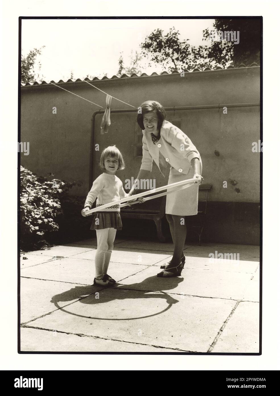 Hula hoop wave: woman and child. [automated translation] Stock Photo ...
