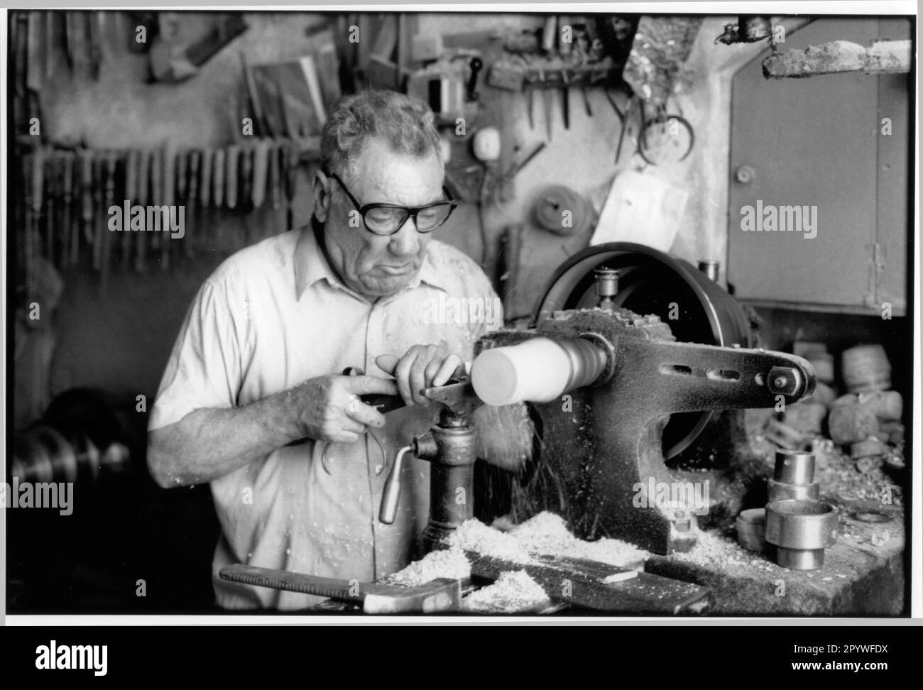 Man working on wood Black and White Stock Photos & Images - Alamy