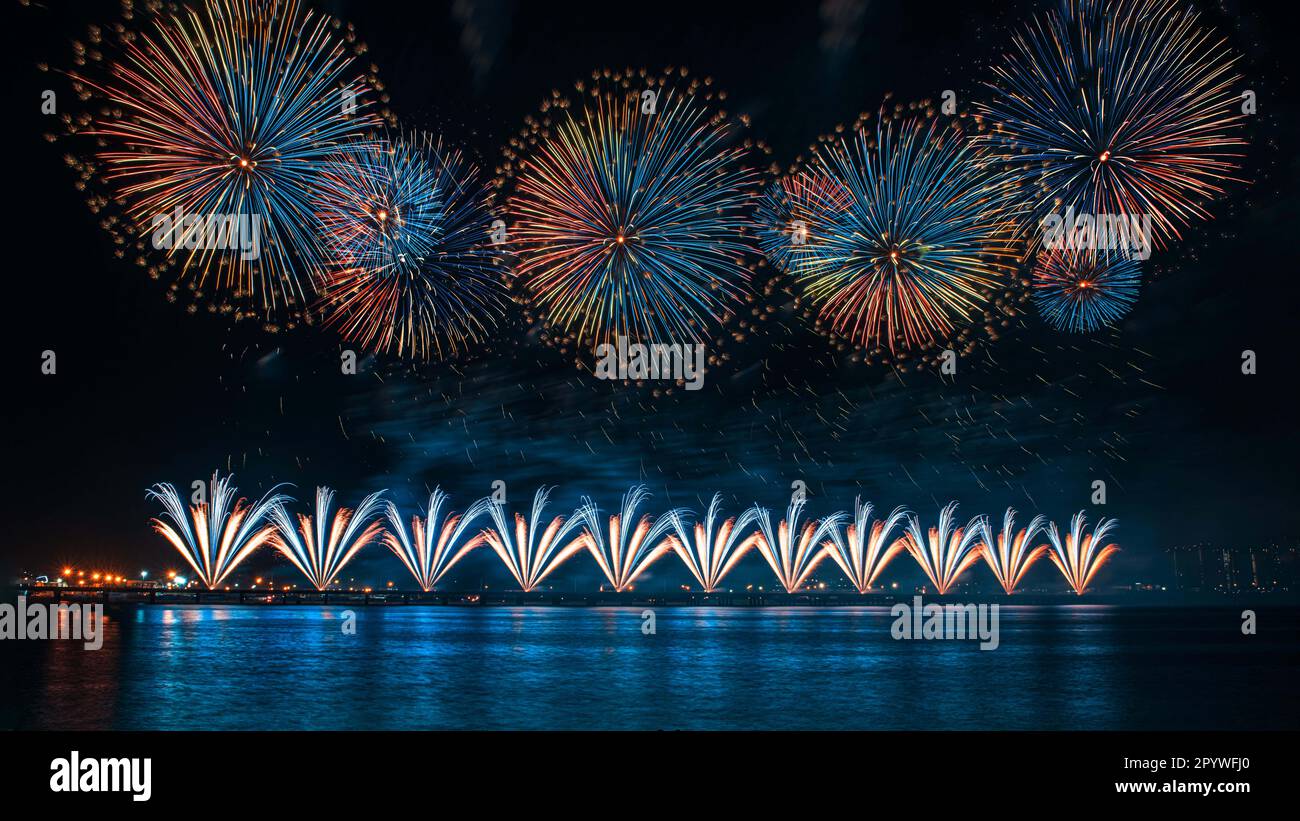 DALIAN, CHINA - MAY 1, 2023 - Fireworks show over the cross sea bridge ...