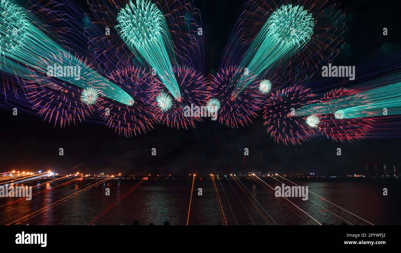 DALIAN, CHINA - MAY 1, 2023 - Fireworks show over the cross sea bridge ...