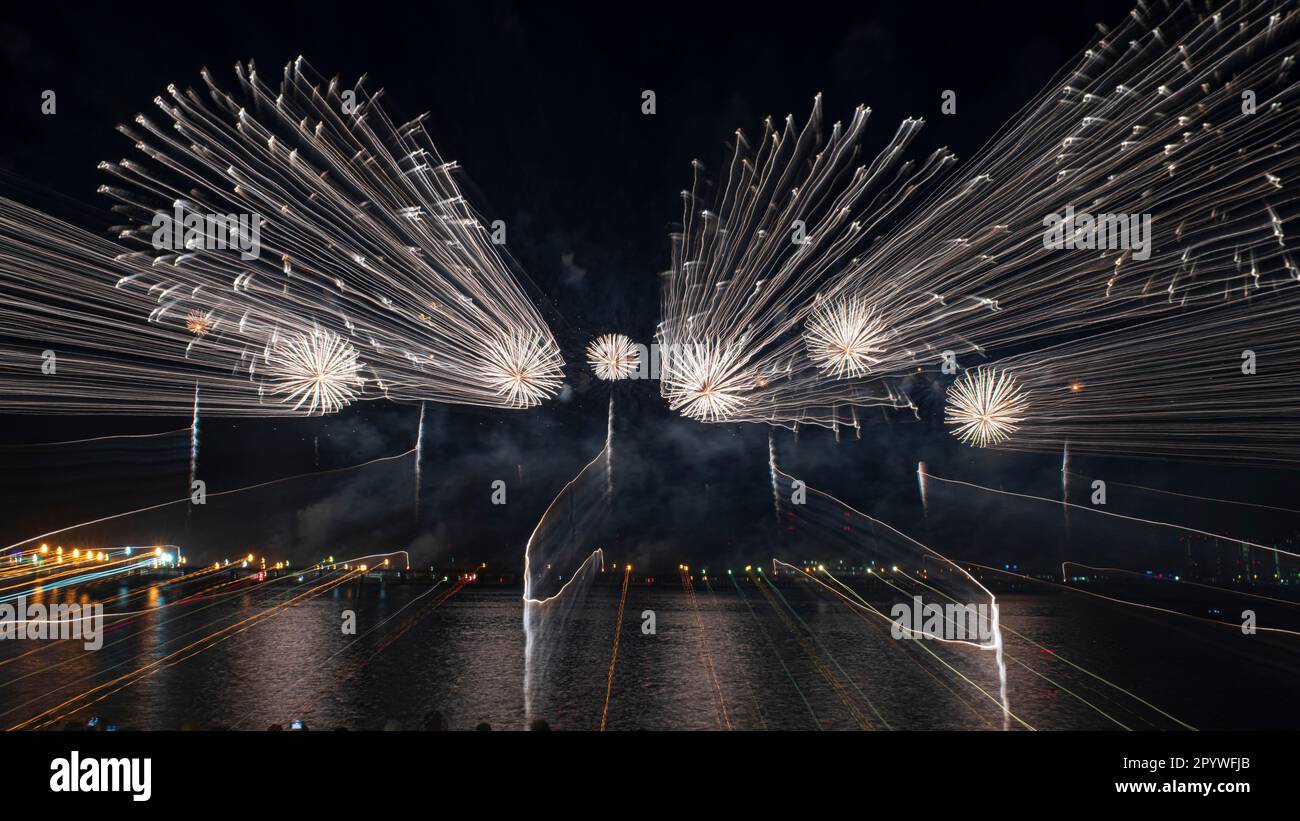DALIAN, CHINA - MAY 1, 2023 - Fireworks show over the cross sea bridge ...