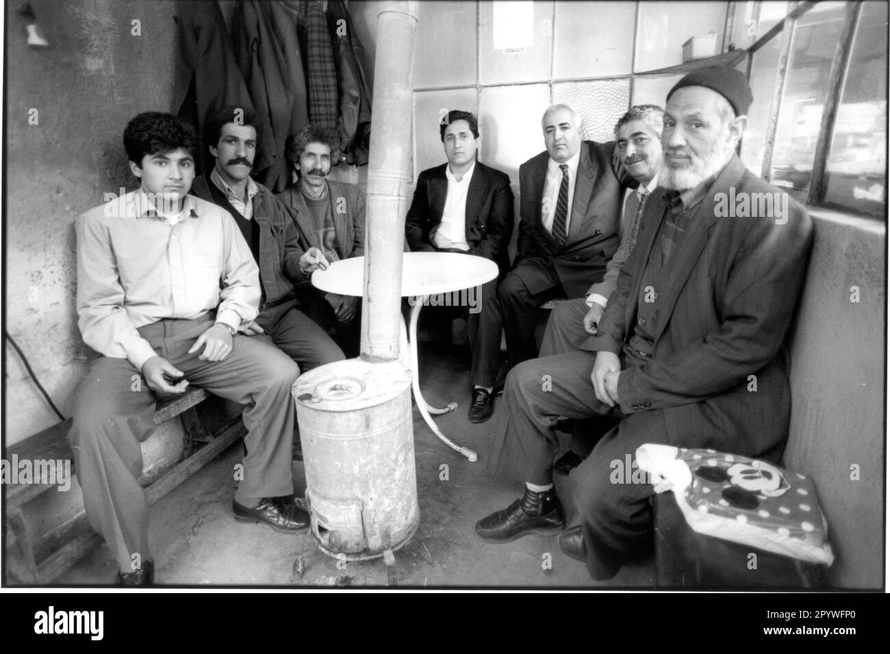 " Ethnology: Turkey, Istanbul. ""Men's Round"". 7 men sit together ...