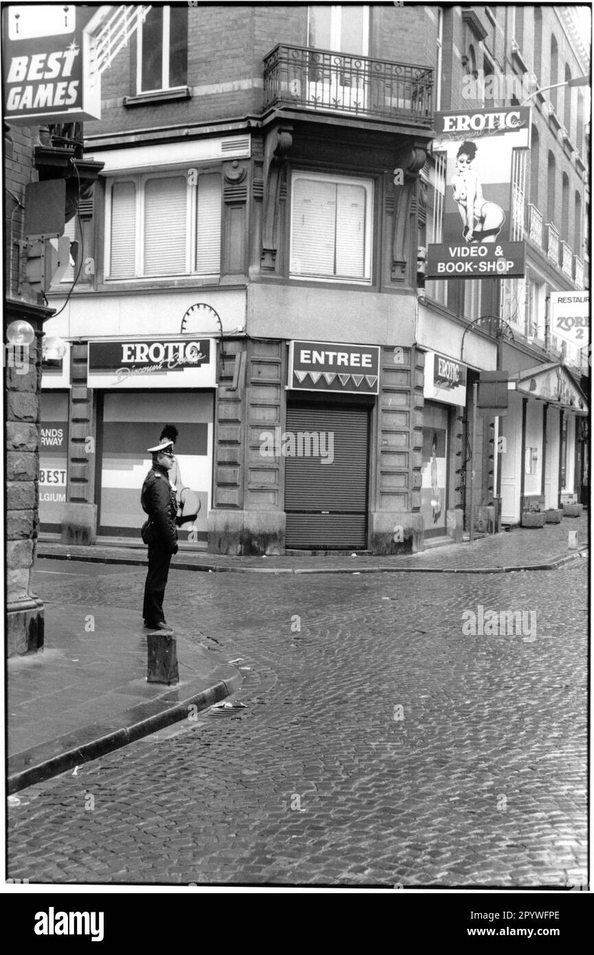 Liège (Belgium), Red light milieu: A policeman is watching the scene ...