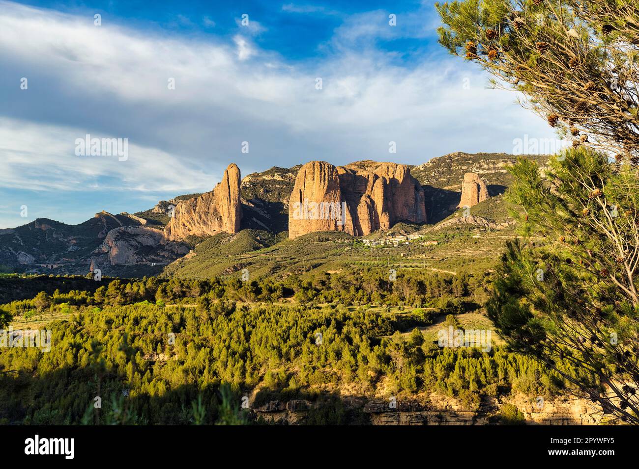 Rock formations Mallos of the Riglos at the village of Las Penas de ...