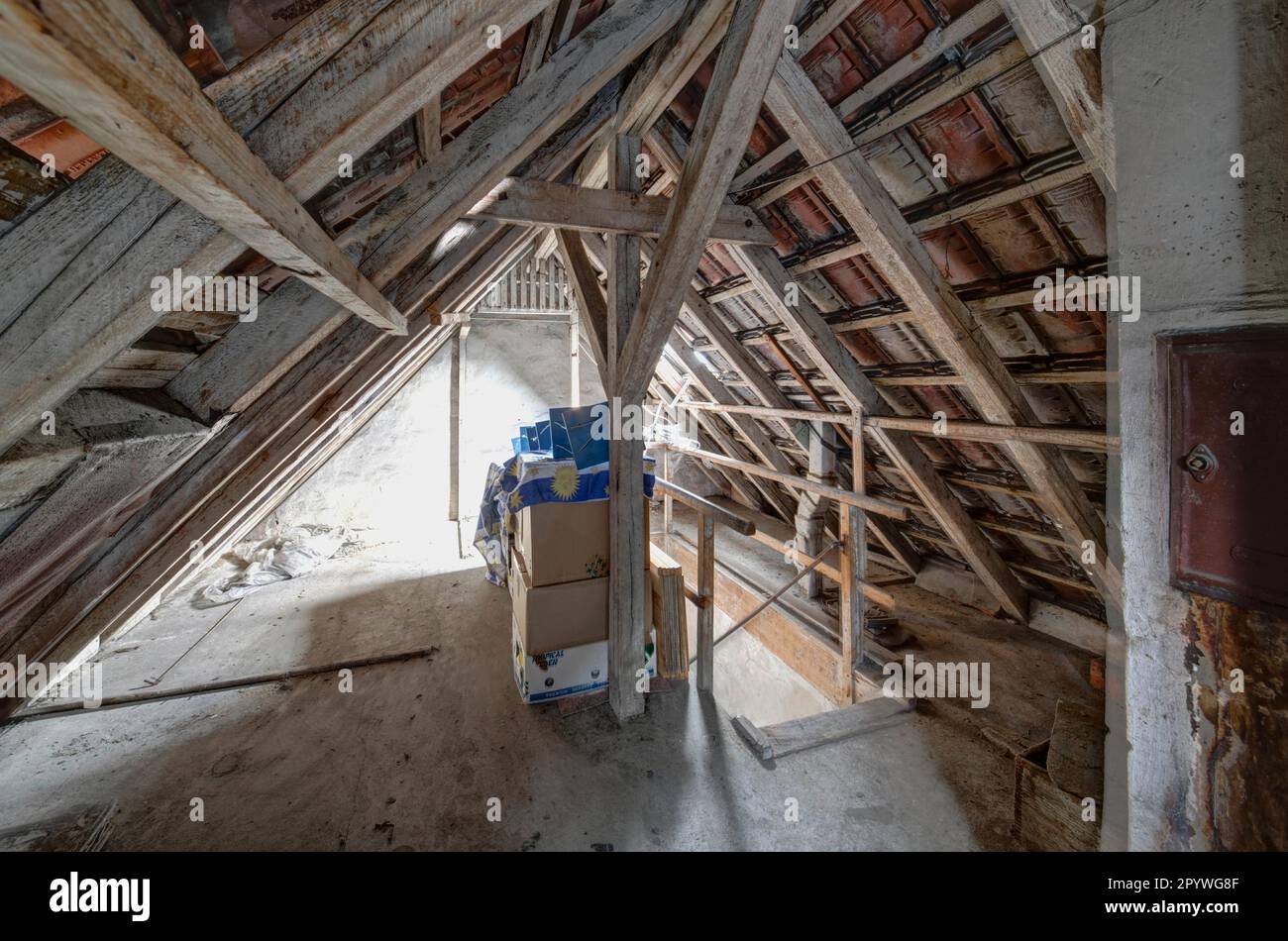 Attic of a residential building, uninsulated and in need of renovation ...