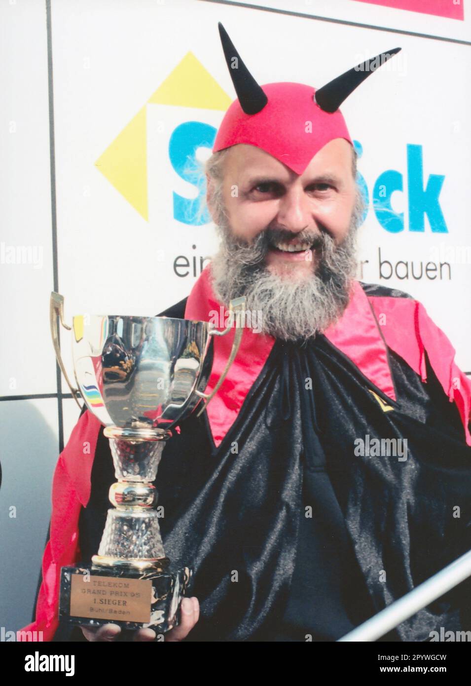 Tour devil Dieter (Didi) Senft shows off the Telekom Grand Prix winner ...