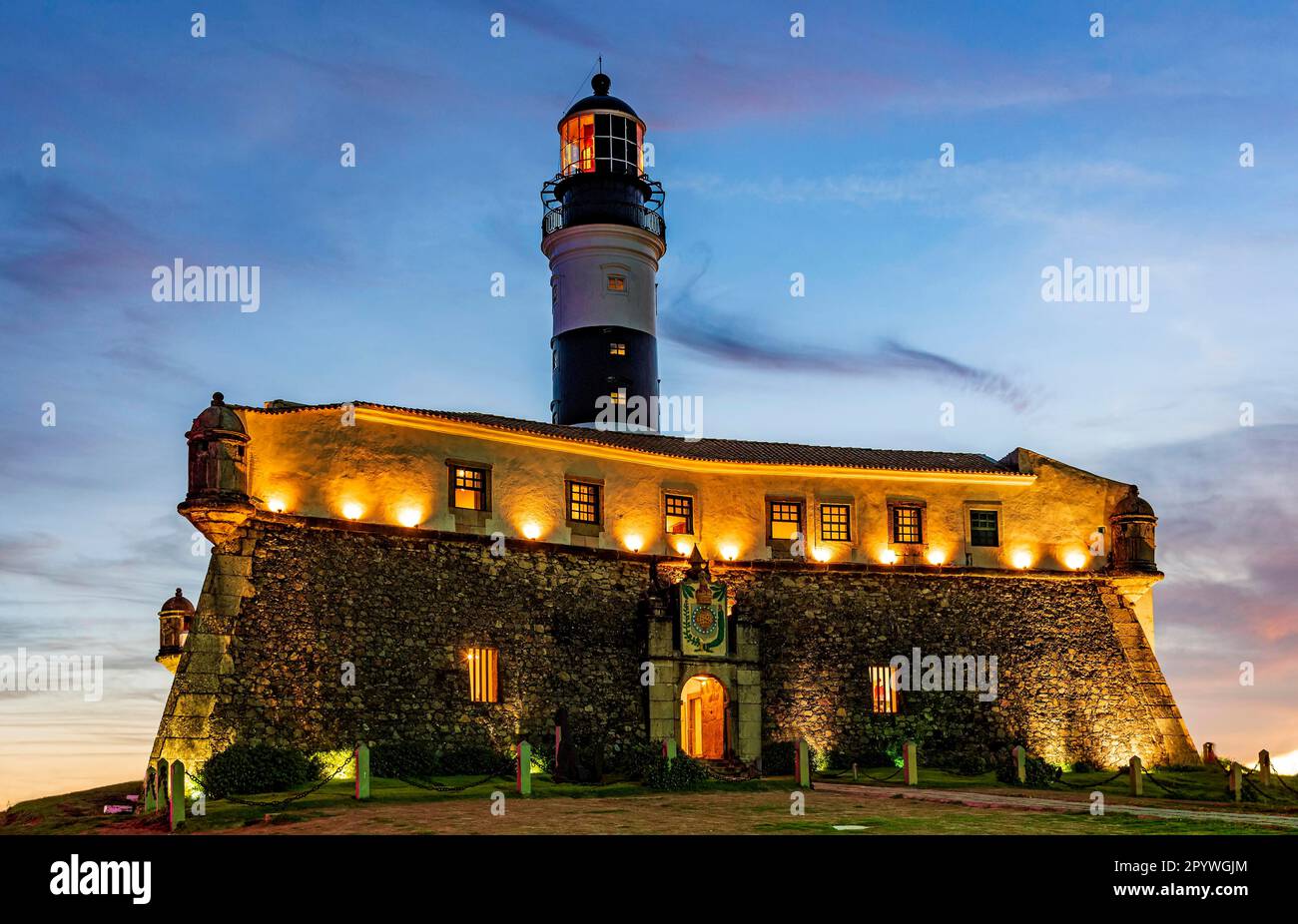 Image of the Farol da Barra lighthouse during sunset in summer at ...