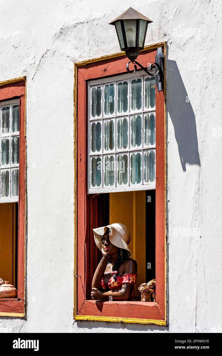 Window decorated with flowers and objects in the historic historic city ...