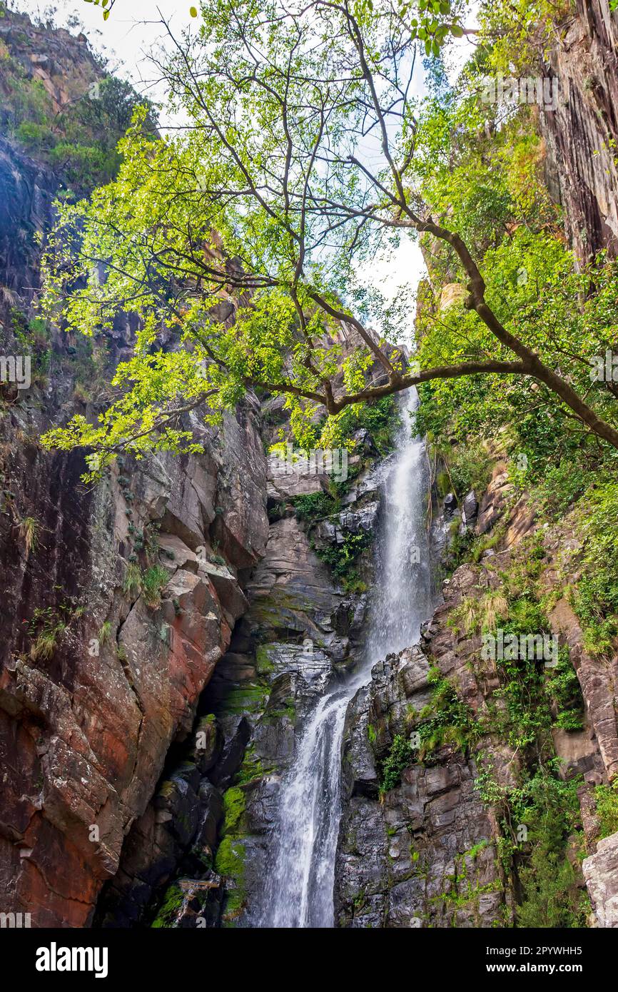 Waterfall among the rocks on a mountainside in the Serra do Cipo region ...
