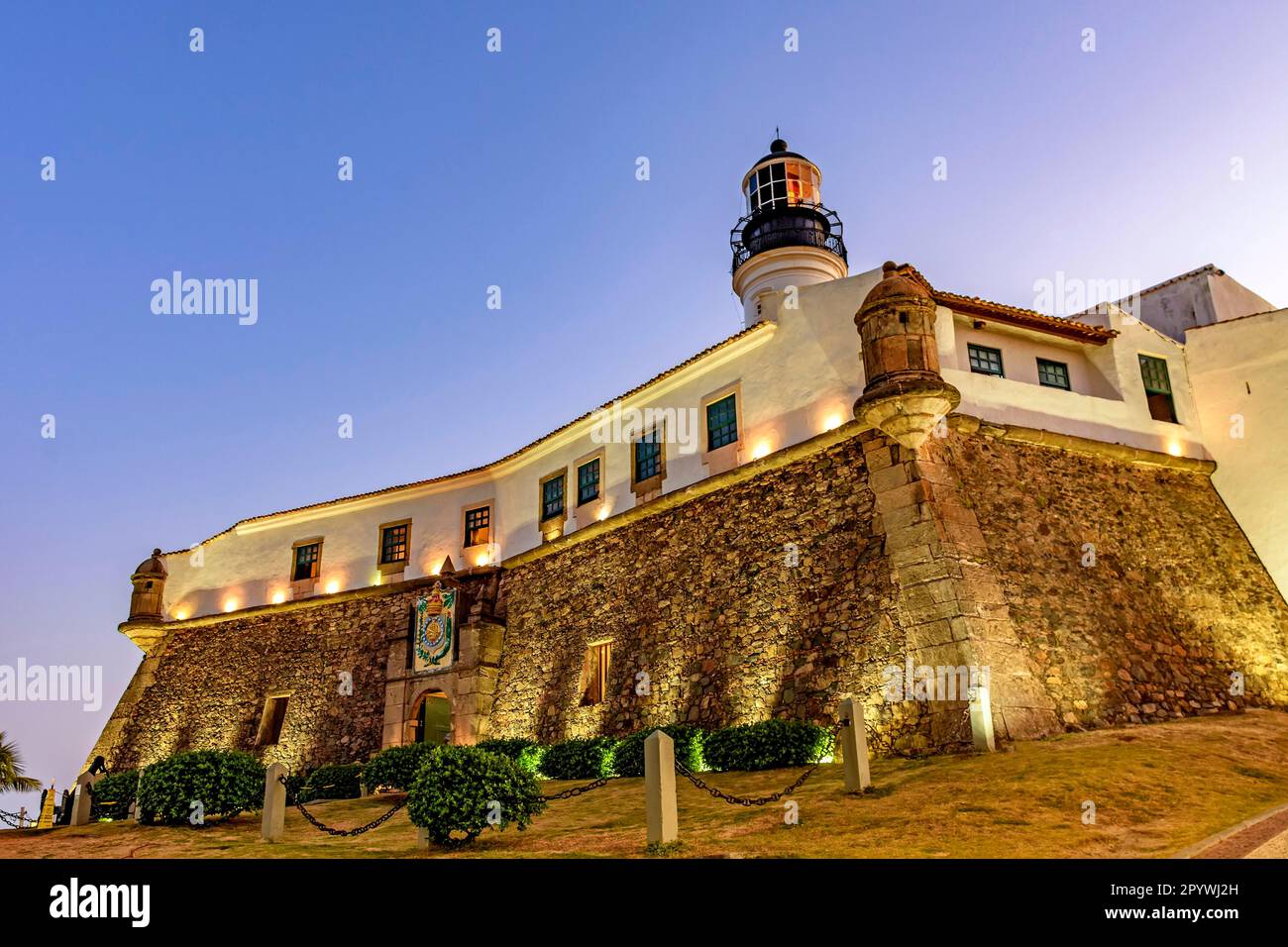 Facade and stone wall of the old and historic fort and lighthouse Barra ...