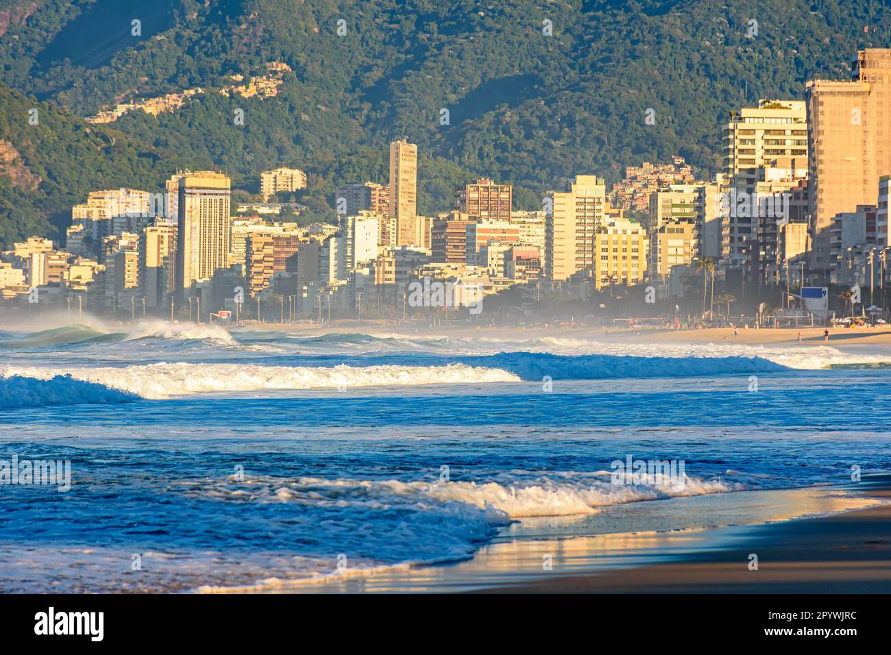 Sunrise on Ipanema beach in Rio de Janeiro with the sea, forest, waves ...