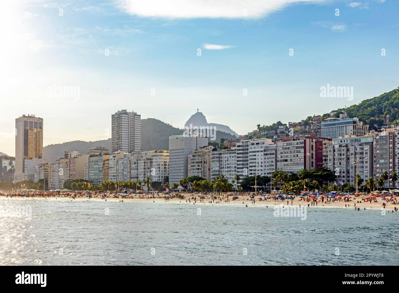 Sunny day at Copacabana Beach in Rio De Janeiro with the slum and the ...