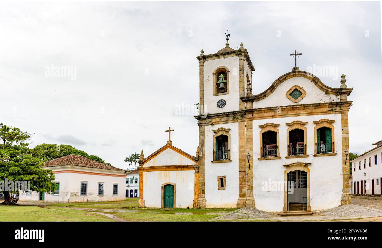 Historic church facade and surrounding houses in the ancient city of ...