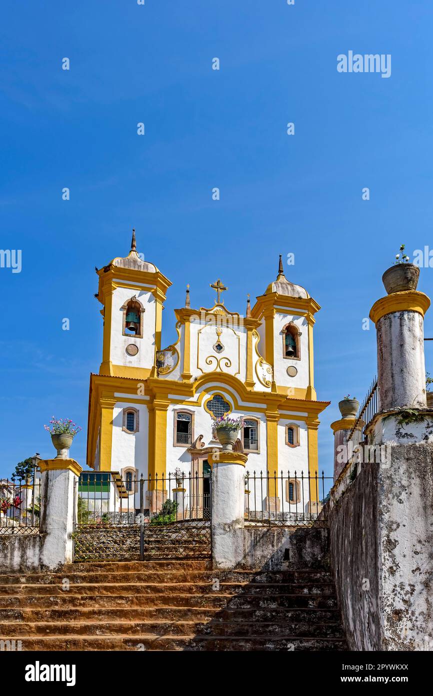 Facade of a historic church in Ouro Preto with blue sky in the ...