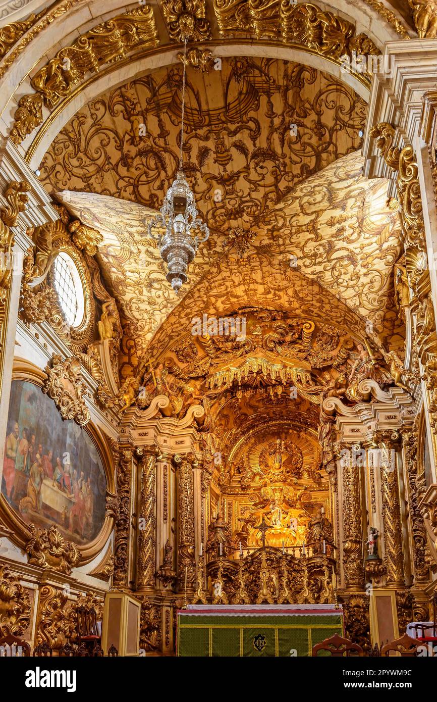 Interior and altar of historic church all painted in gold with baroque ...